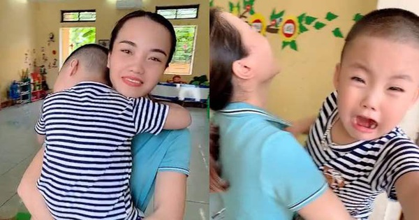 Bé trai đang rất ngoan khi được cô bế, bất ngờ tủi thân khi thấy mẹ